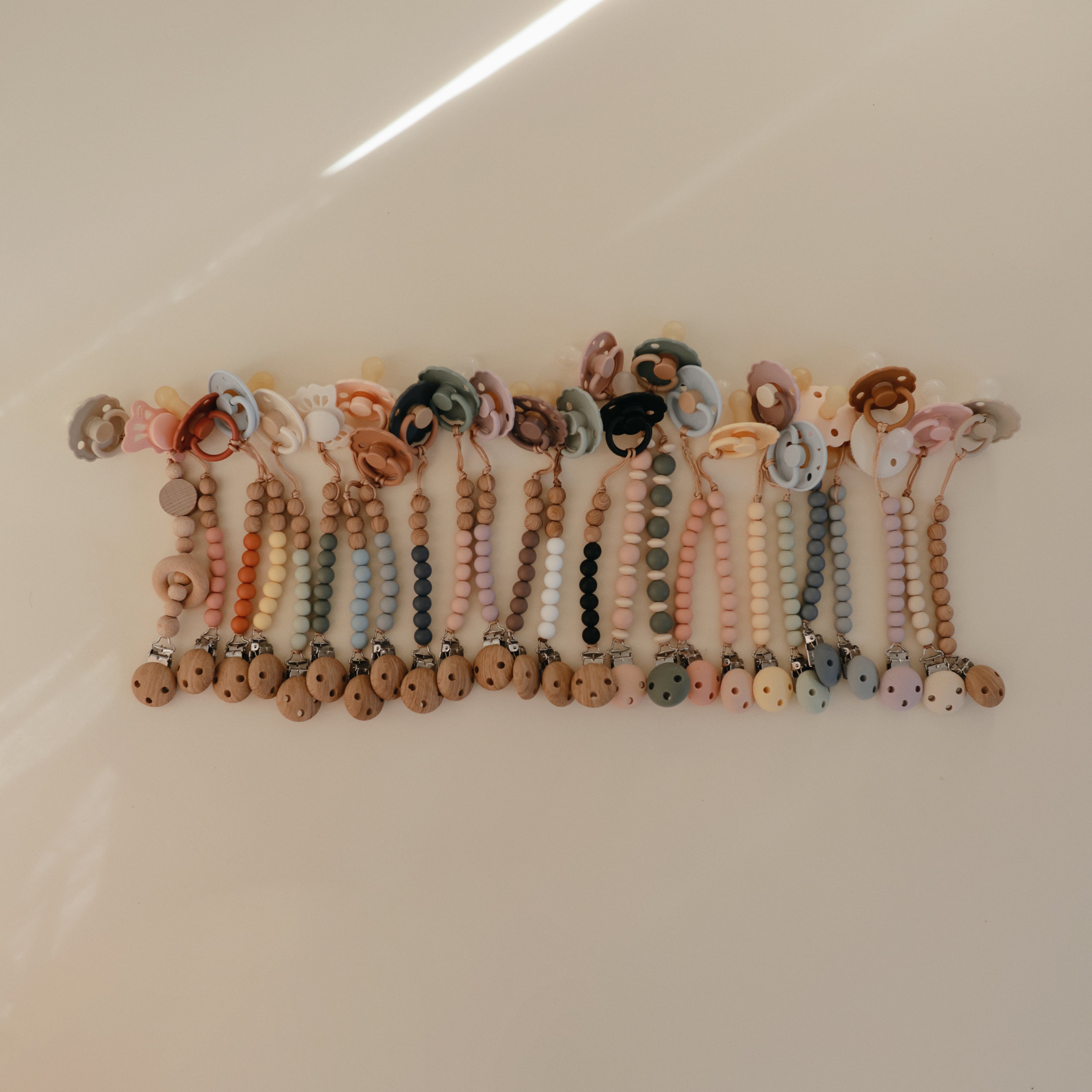 Mushie Silicone Pacifier Clip | Mila