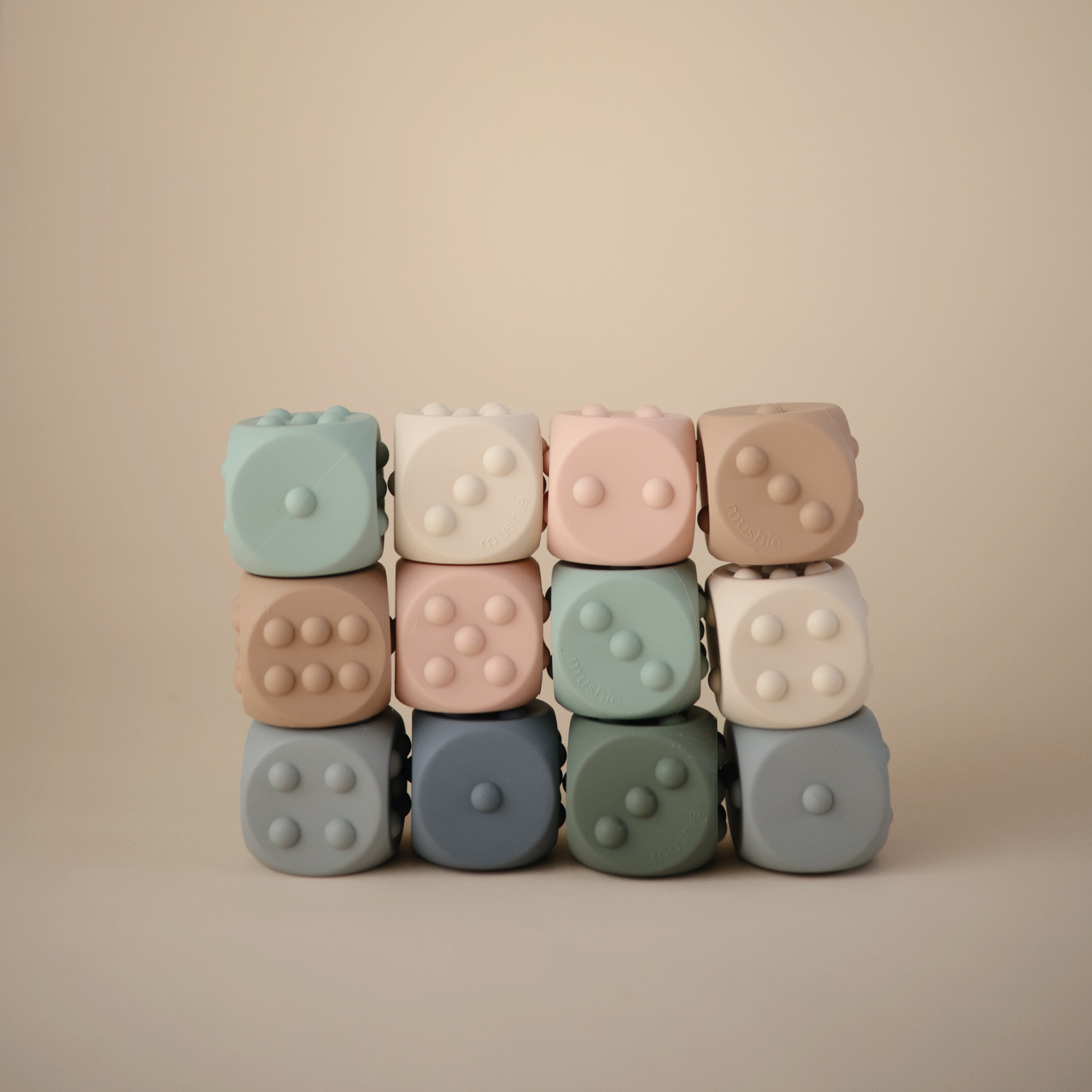 Dice Press Toy – Mushie