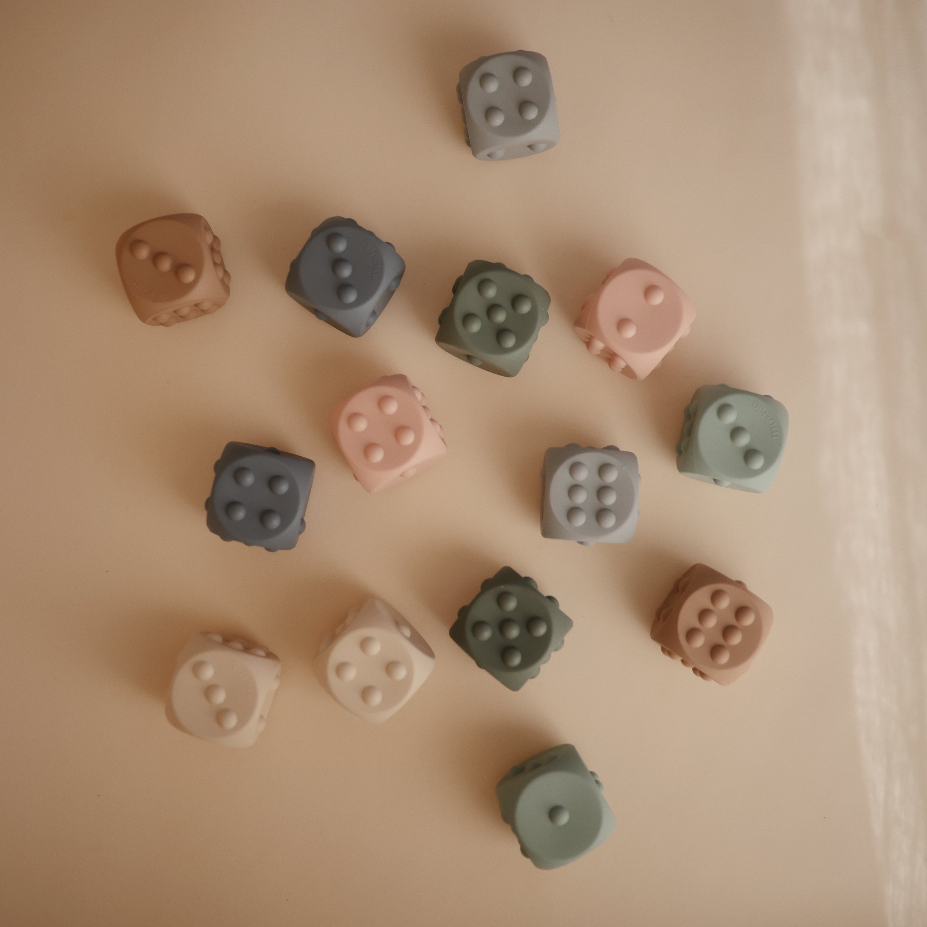 Dice Press Toy – Mushie